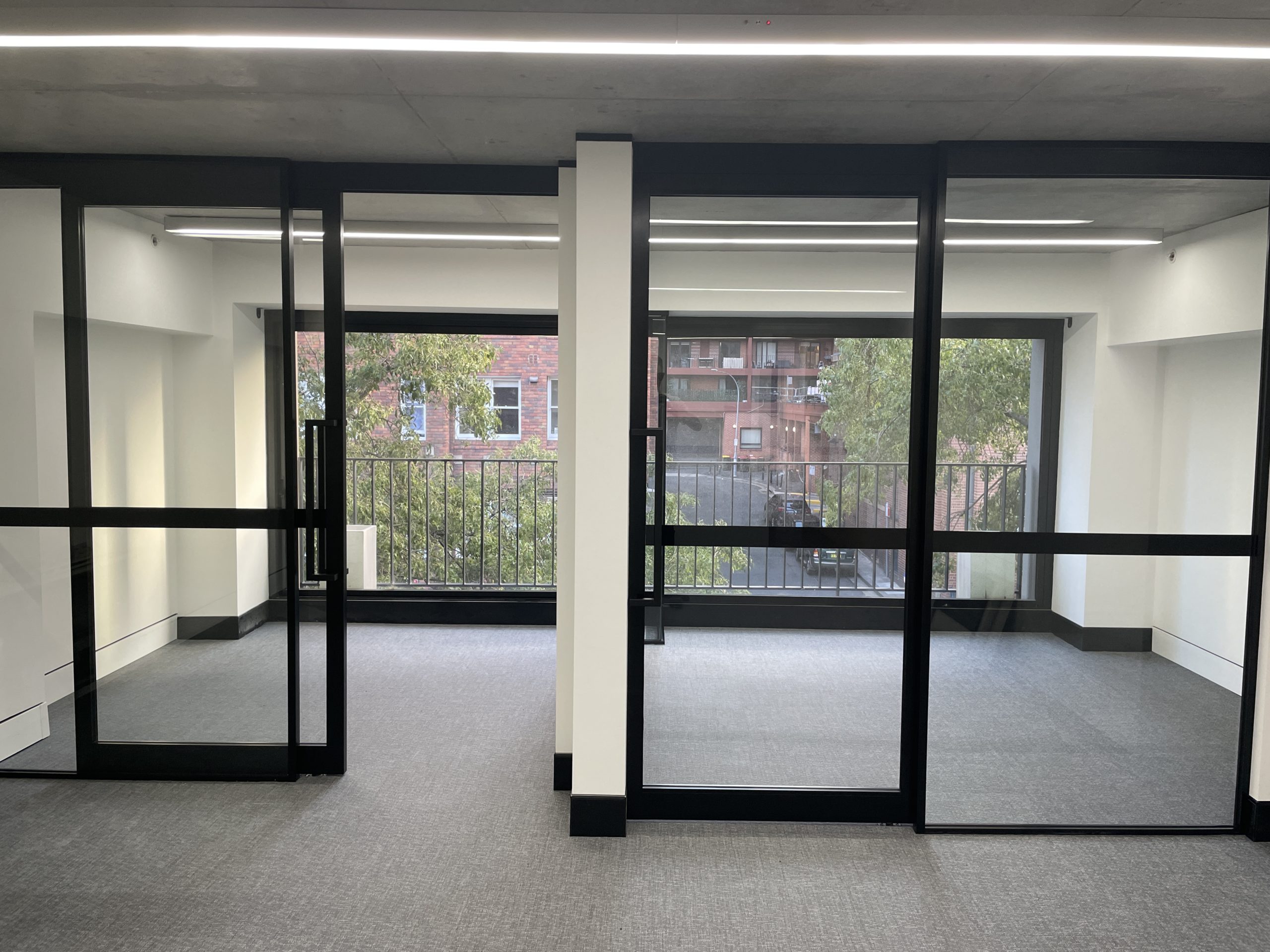 Glass Doors for Offices | DY Constructions Australia